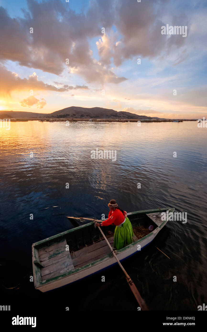 South America, Peru, fisherwoman in fishing boat, Uru people Stock ...