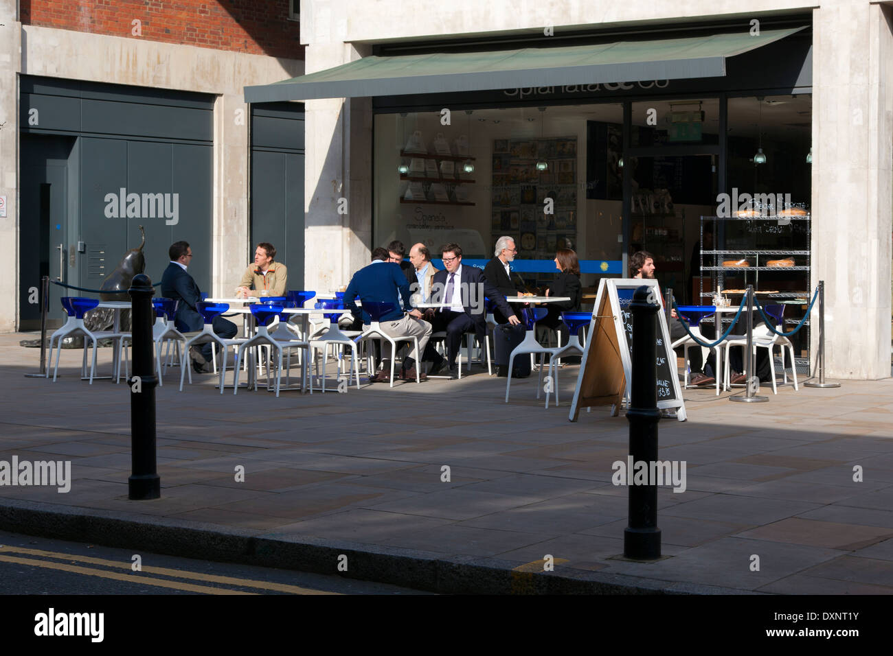 People Outside Cafe in Spring Sunshine Stock Photo - Alamy