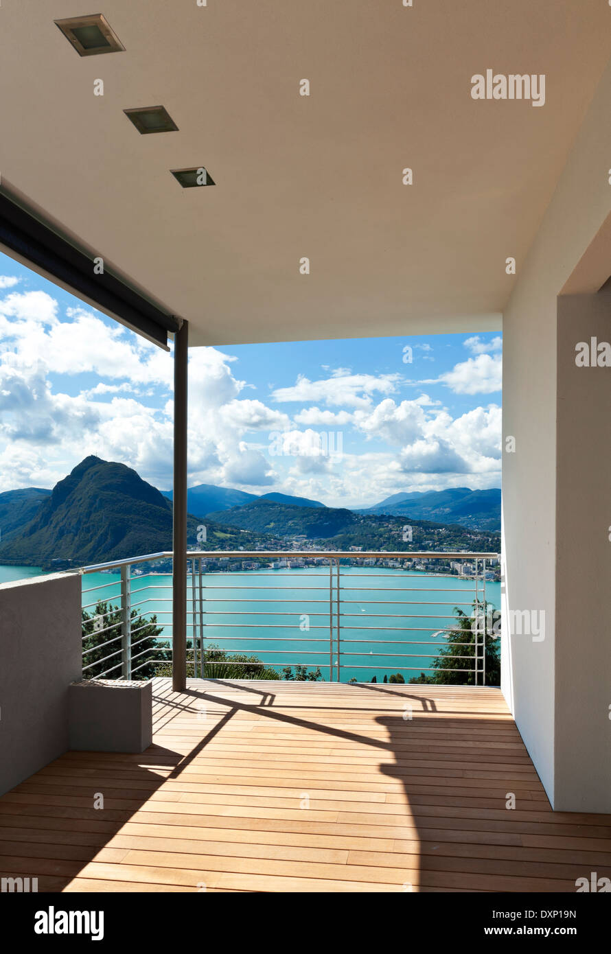 Modern apartment, balcony overlooking the lake Stock Photo - Alamy