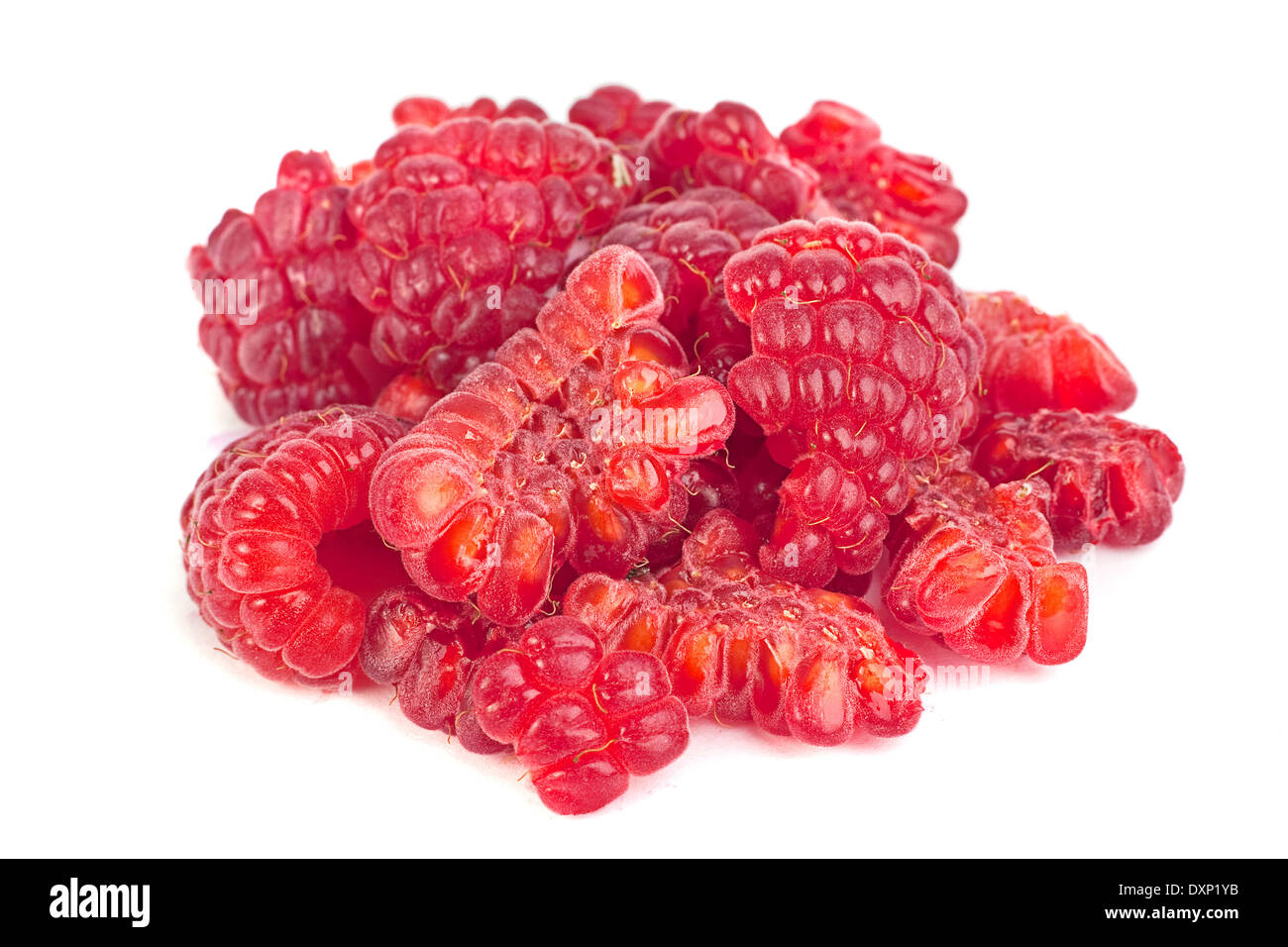 Raspberry fruit broken part isolated on white Stock Photo - Alamy