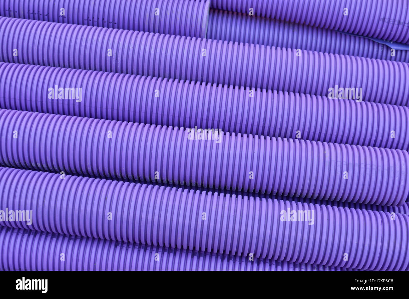 Large purple plastic tubes Stock Photo - Alamy
