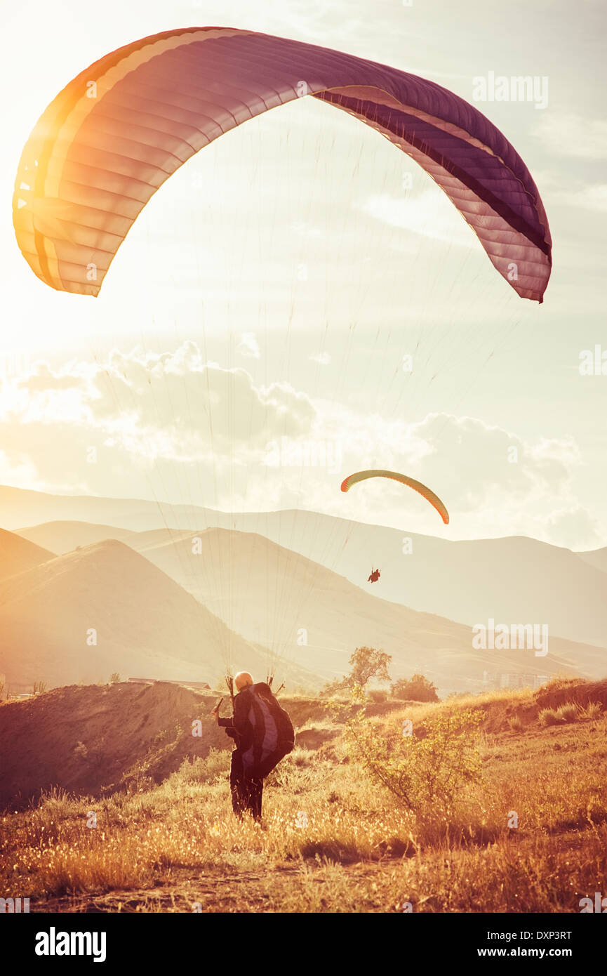 Paragliding extreme Sport with mountains on background Healthy ...
