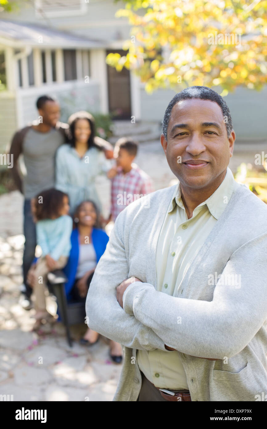 Woman foreground family background hi-res stock photography and images ...