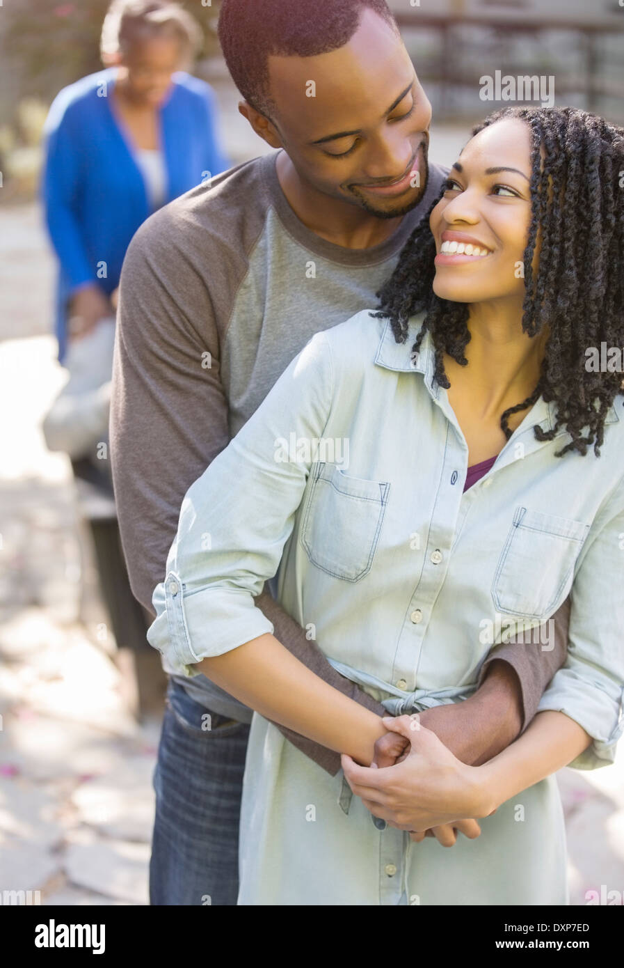 Happy couple hugging outdoors Stock Photo - Alamy Happy couple hugging outdoors Stock Photo - Alamy