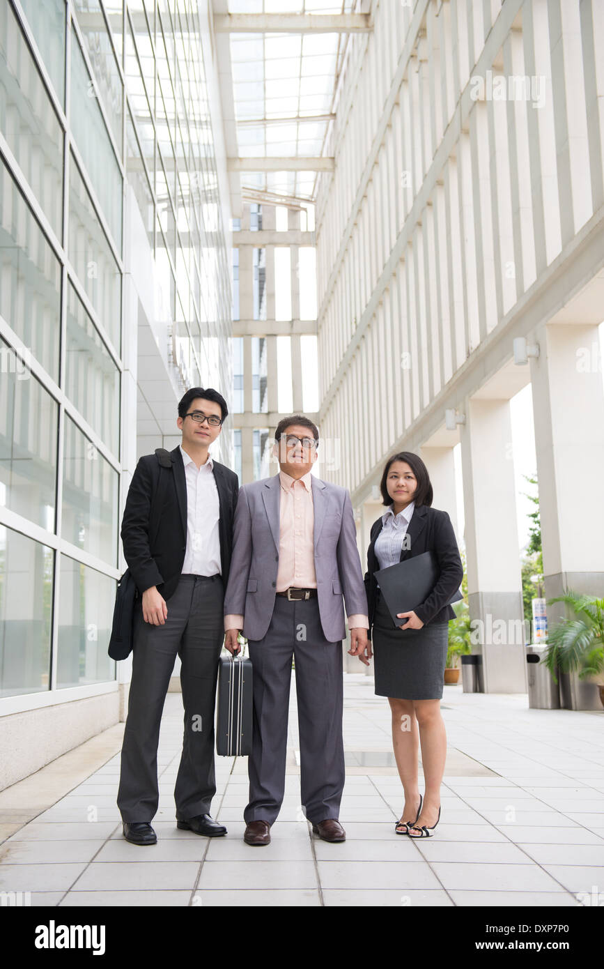 asian business team in office background Stock Photo - Alamy