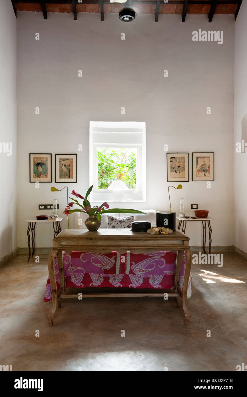 Bedroom interior with uncurtained window in the Indian state of Goa ...