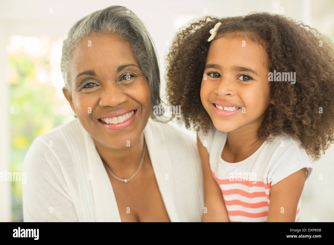 Grandmother and granddaughter smiling hi-res stock photography and ...