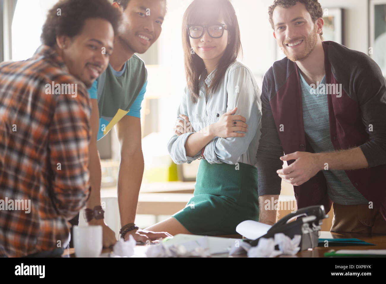 Portrait of creative business people in meeting at desk Stock Photo - Alamy