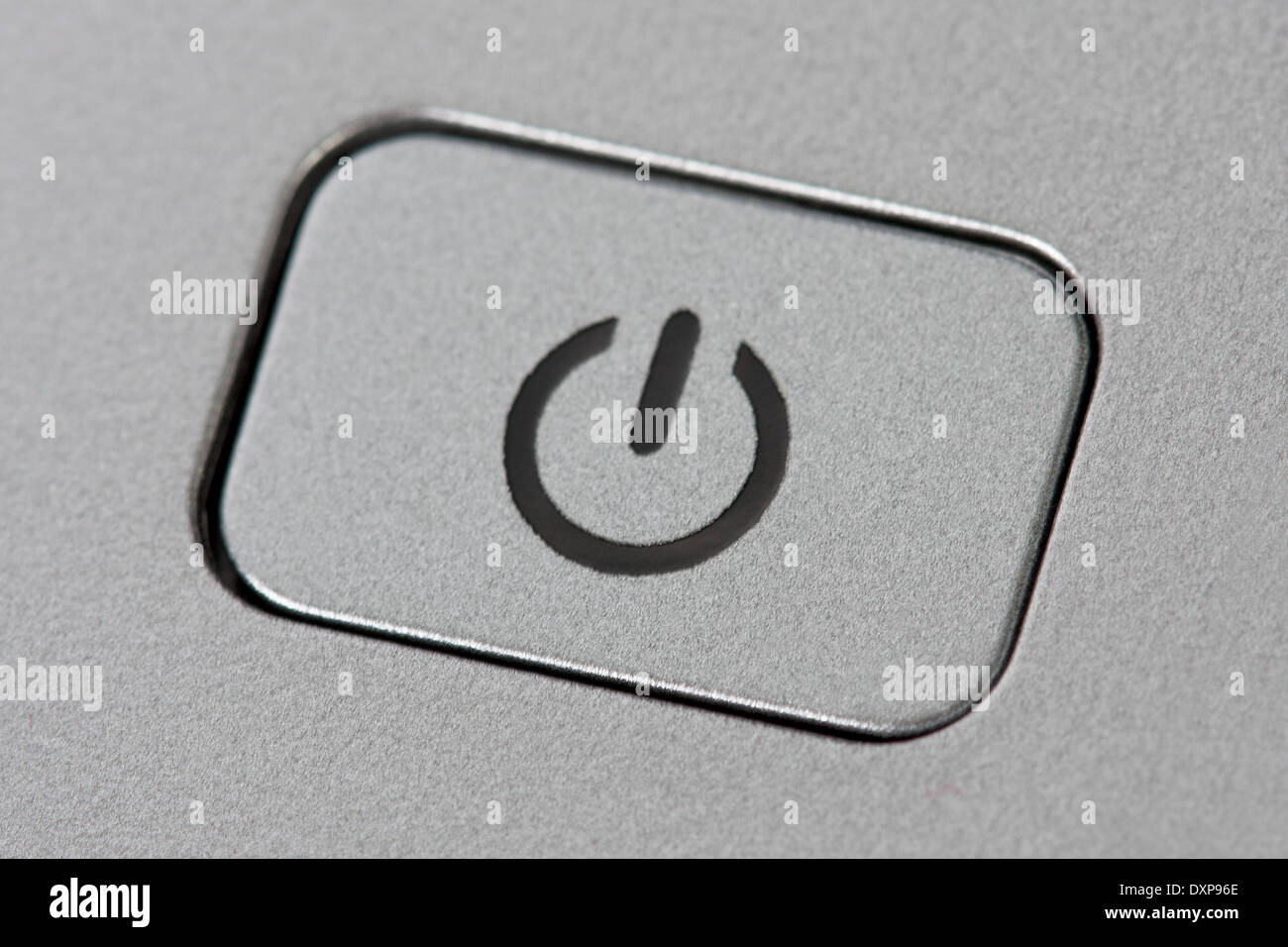 Metallic power button on a laptop Stock Photo - Alamy