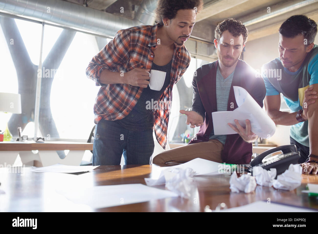 Business people reviewing paperwork hi-res stock photography and images ...