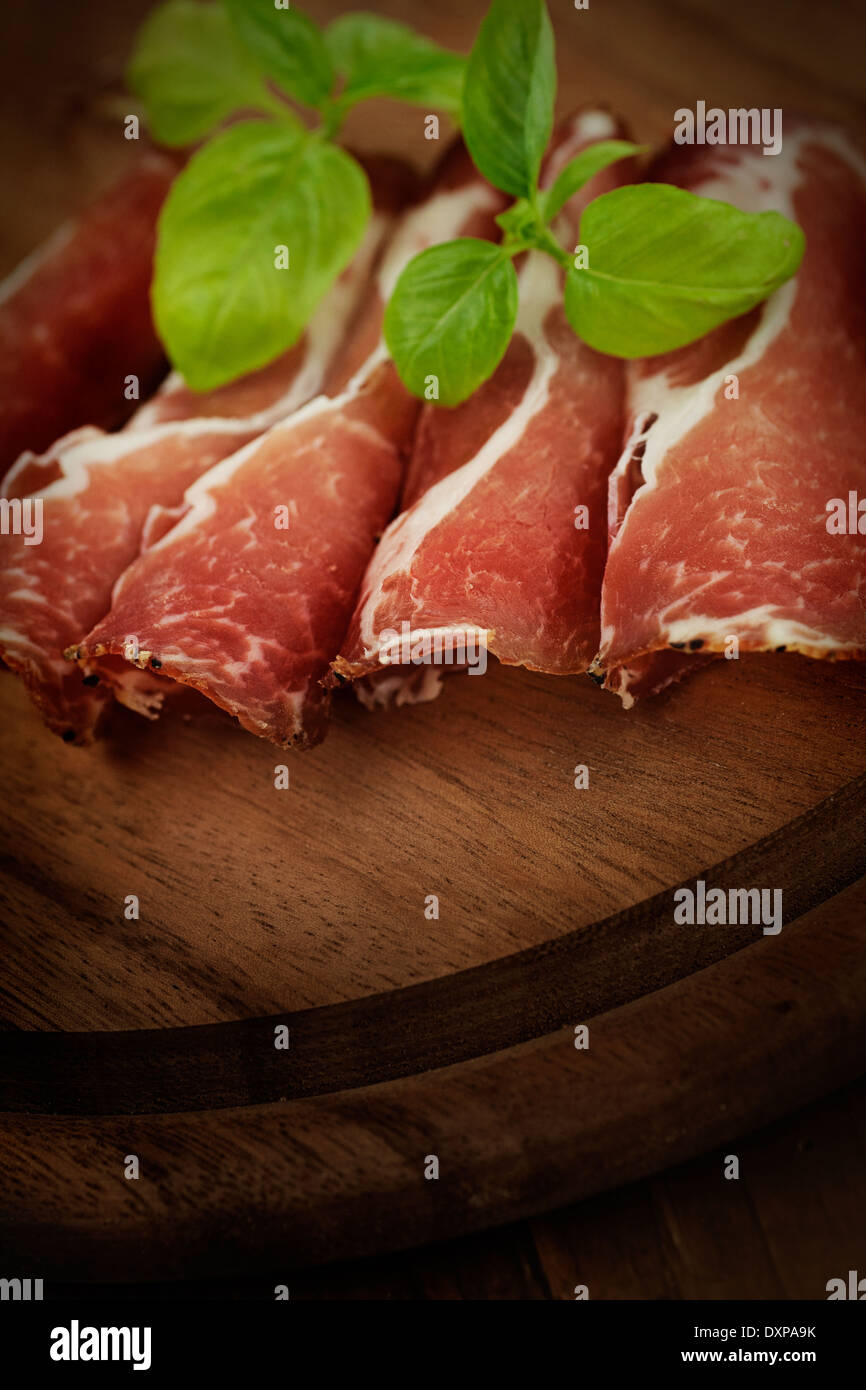 Dried pork collar salami ham with herbs Stock Photo - Alamy