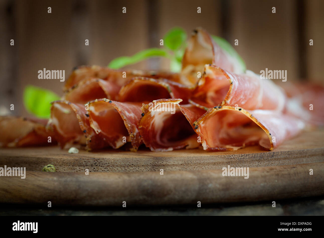 Dried pork collar salami ham with herbs Stock Photo - Alamy