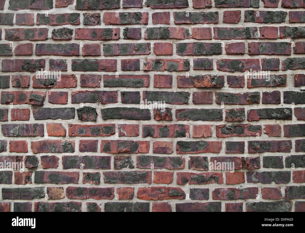 Stained red brick wall hi-res stock photography and images - Alamy