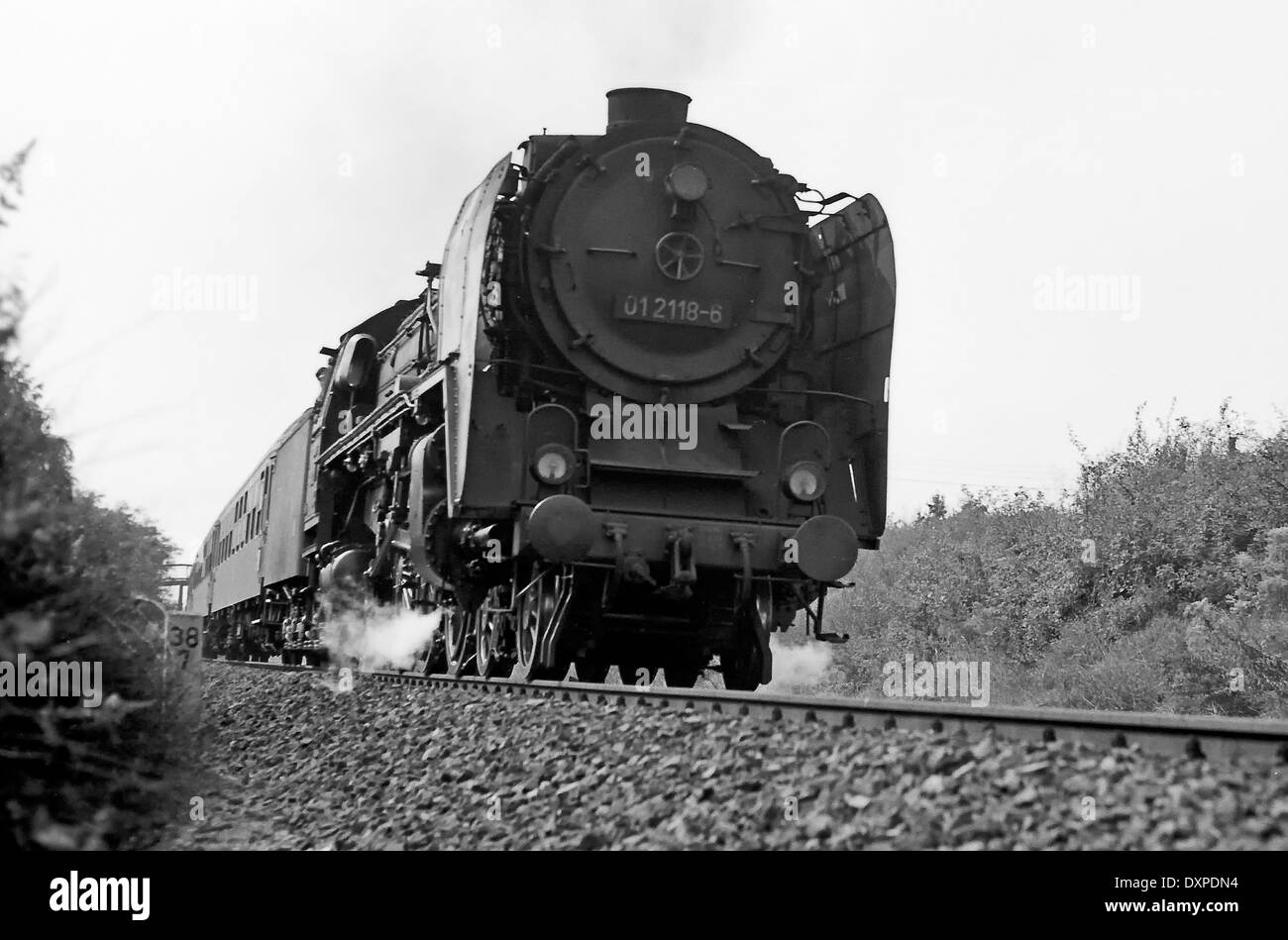 Berlin, DDR, steam locomotive 01 2118 on the open road in Berlin ...