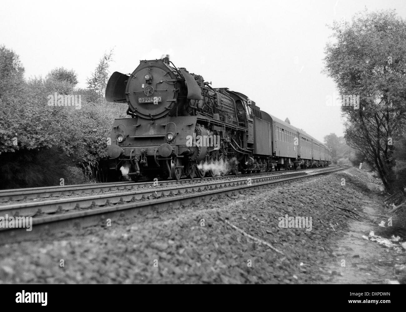 Berlin, DDR, steam locomotive 03 2242 on the open road in Berlin ...
