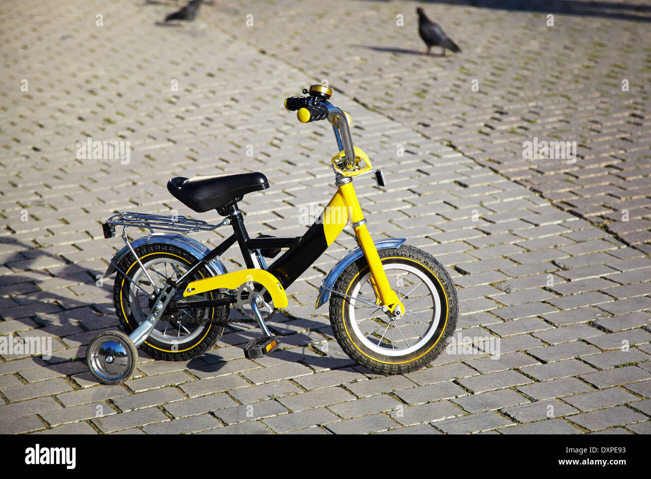 Children's yellow bicycle Stock Photo - Alamy