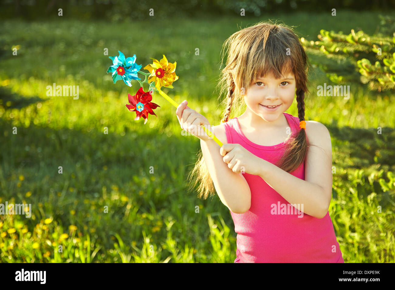 girl with pinwheel Stock Photo - Alamy