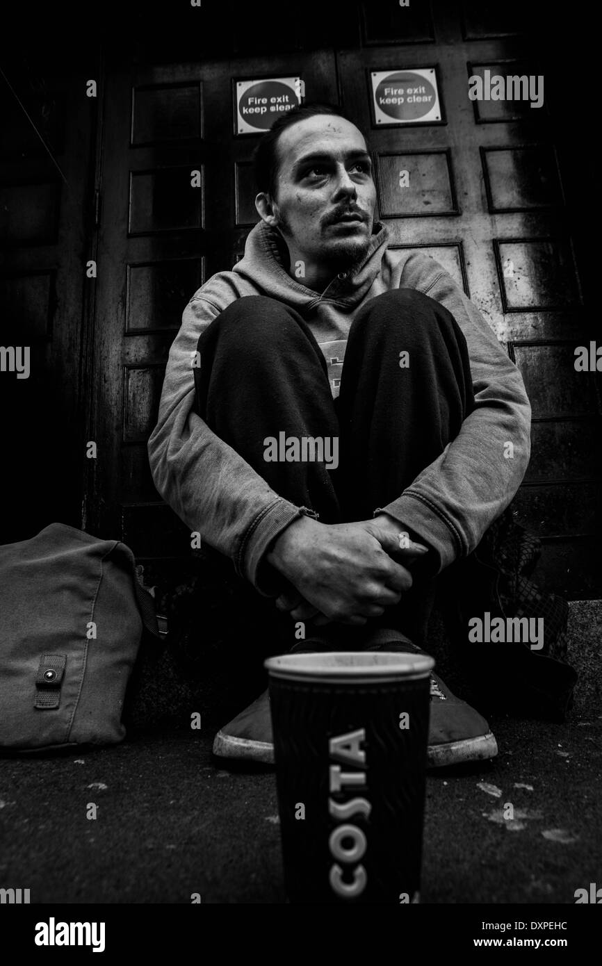 Begging cup hi-res stock photography and images - Alamy