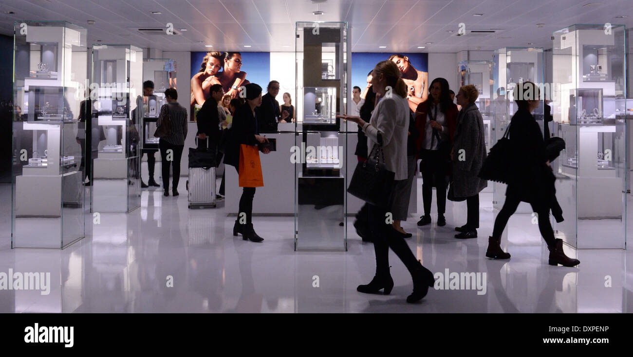 Fair visitors attend the International watch and jewellery fair ...