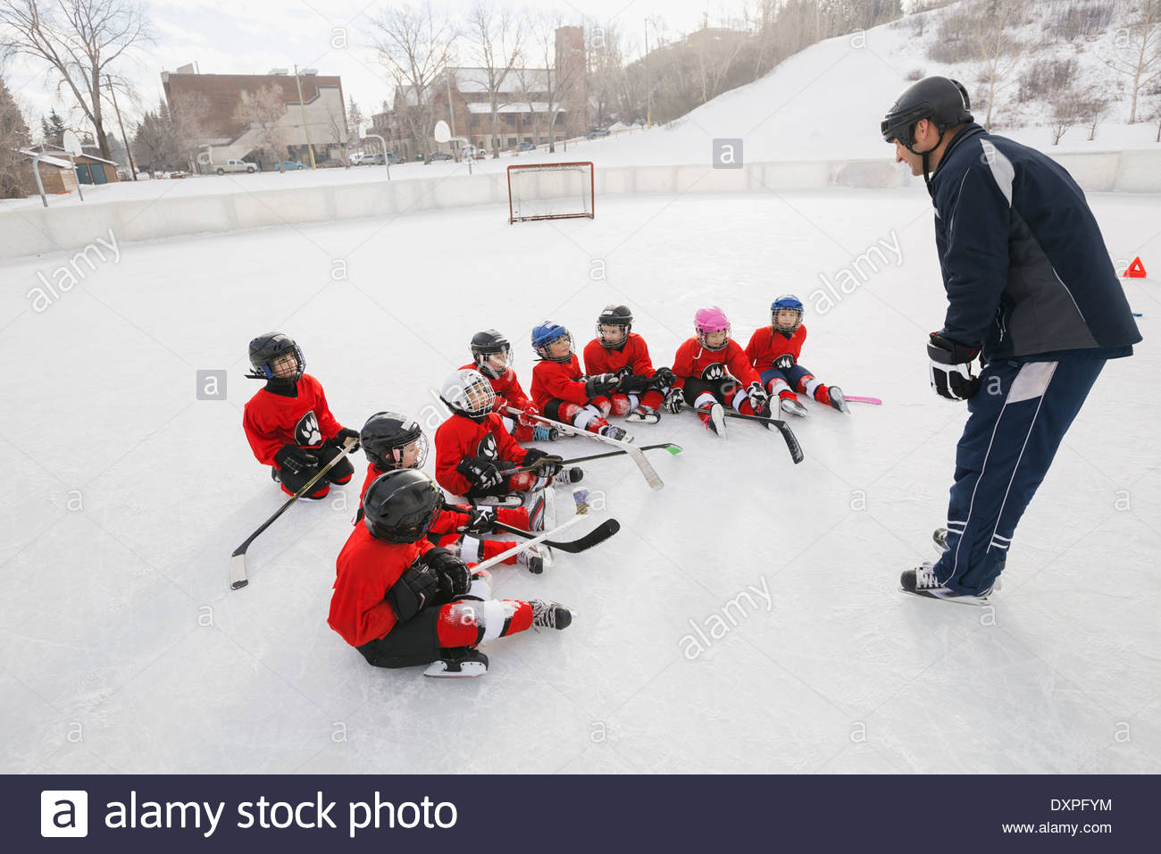 Ice players hockey coach hi-res stock photography and images - Alamy