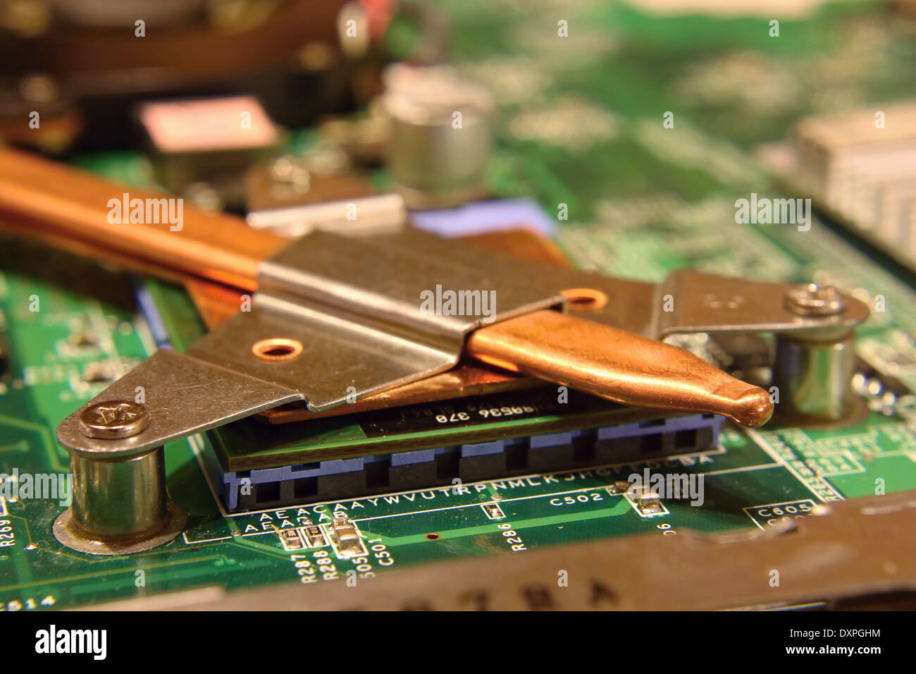 PCB with populated components on green layer Stock Photo - Alamy
