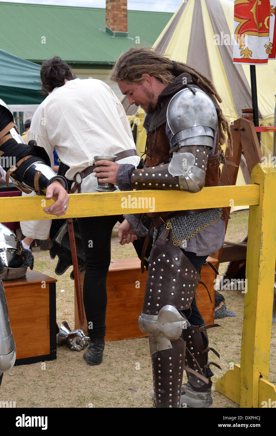 A medieval fair reenactor exhausted after battle Stock Photo - Alamy