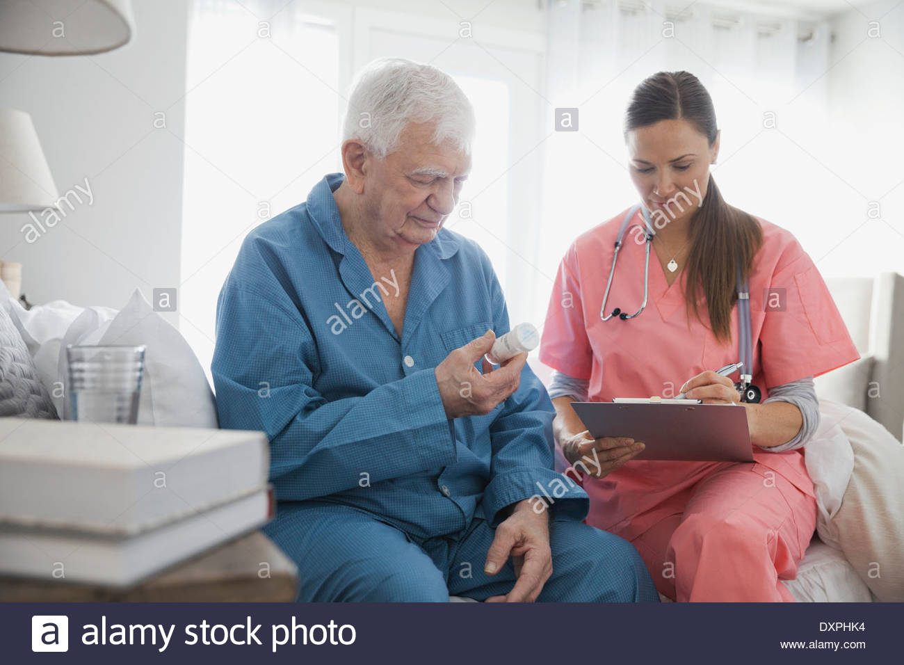 Man prescribing hi-res stock photography and images - Alamy