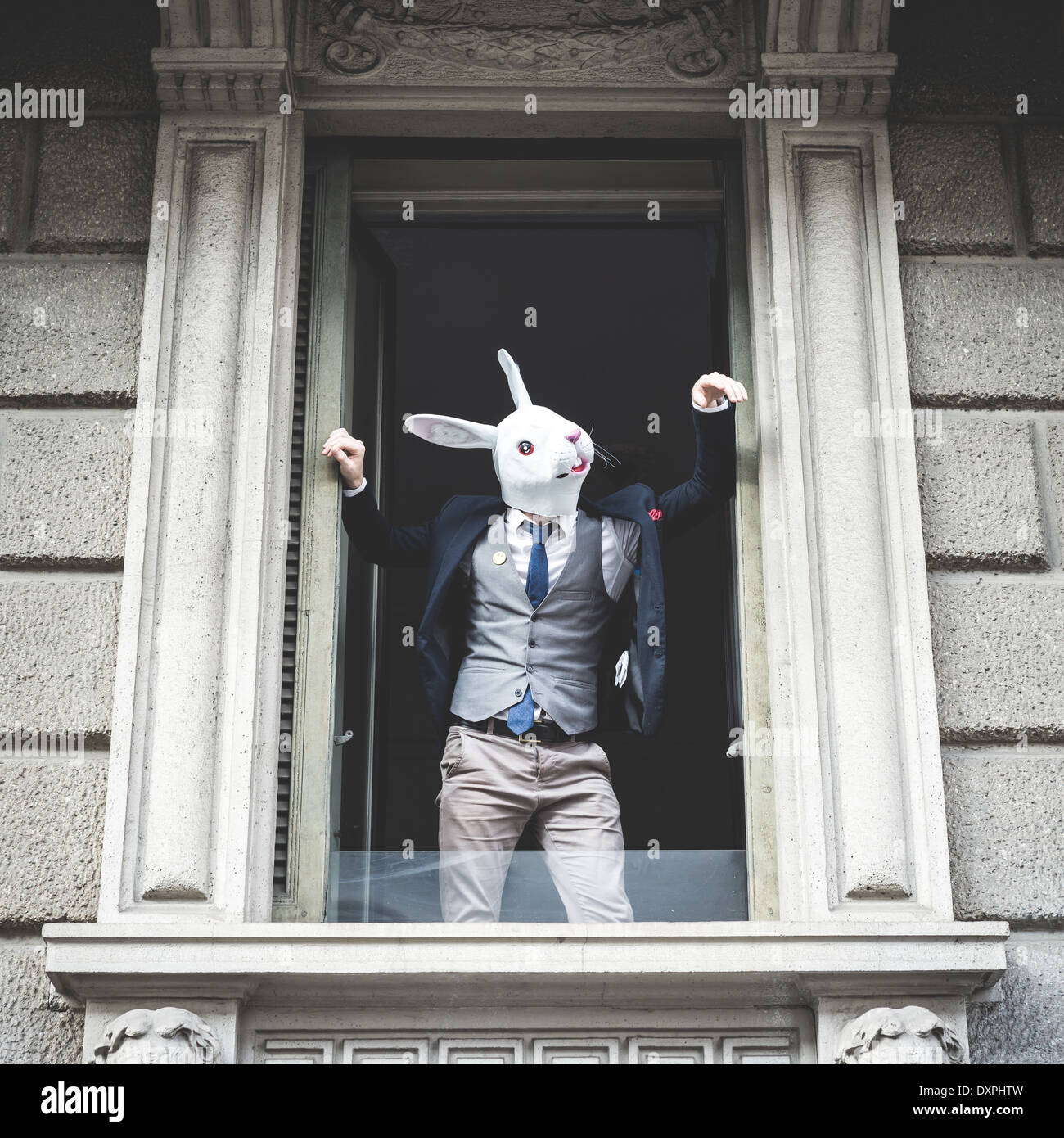 rabbit mask man appeared at the window in the city Stock Photo - Alamy