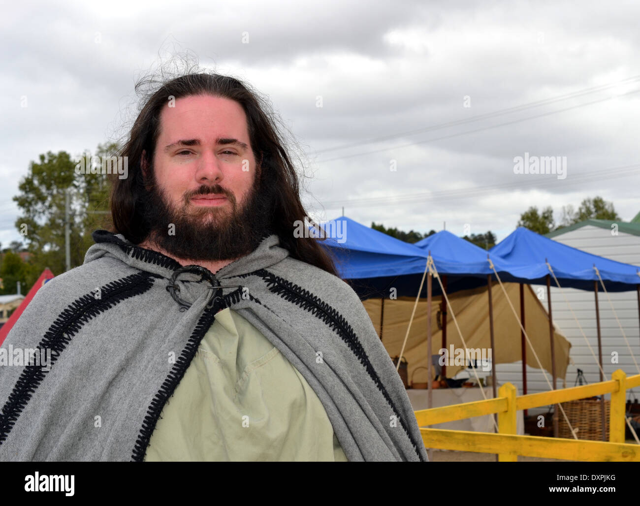 Medieval man in cloak Stock Photo - Alamy
