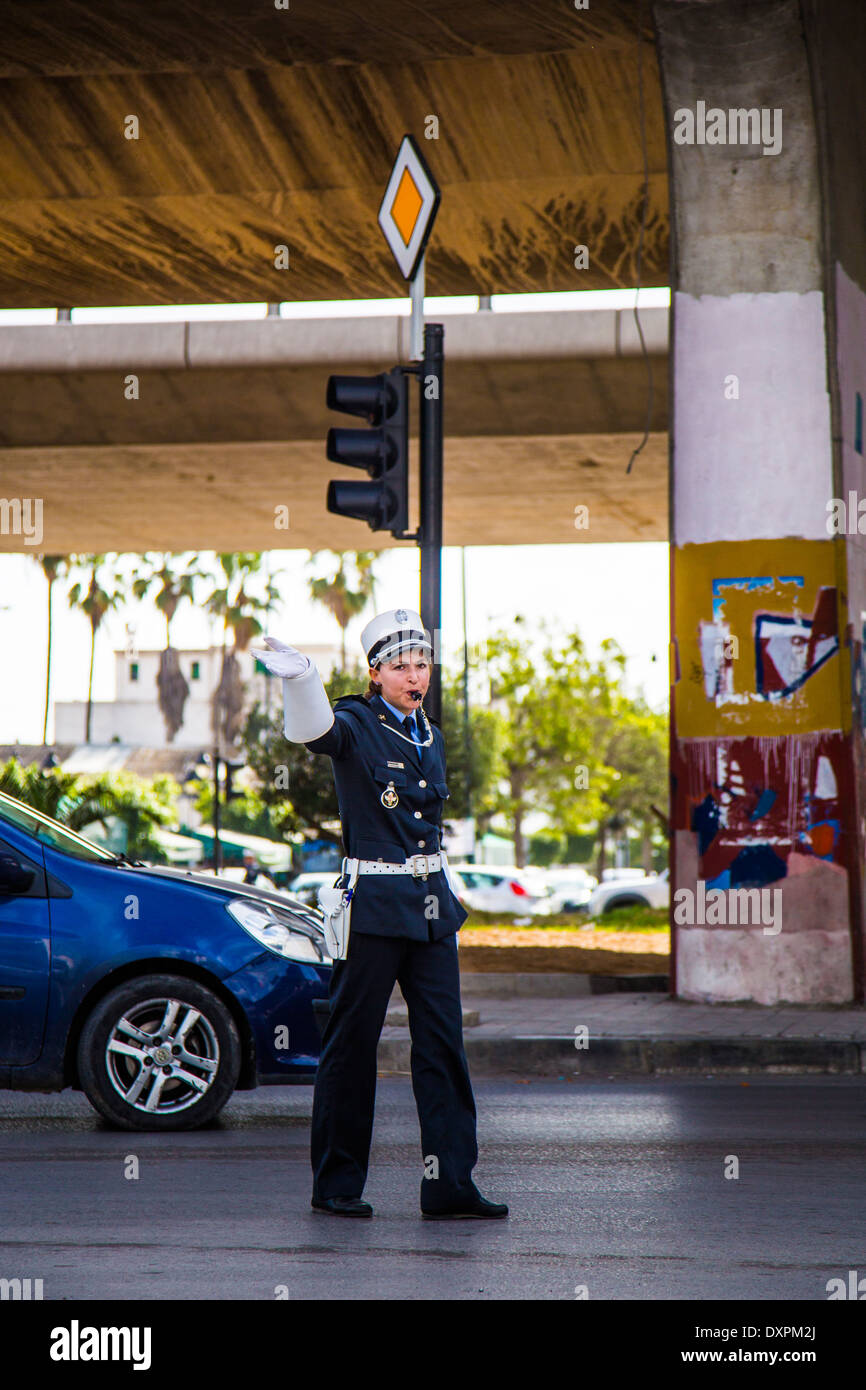 Female officer directing traffic in Tunis, Tunisia Stock Photo - Alamy
