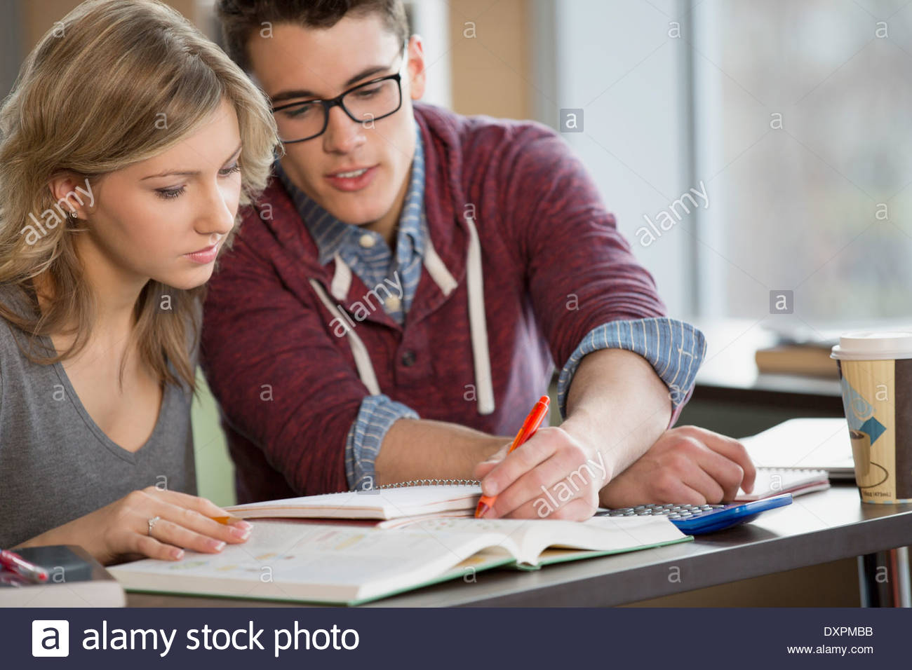 Classmate Helping Friend Stock Photos & Classmate Helping Friend Stock ...