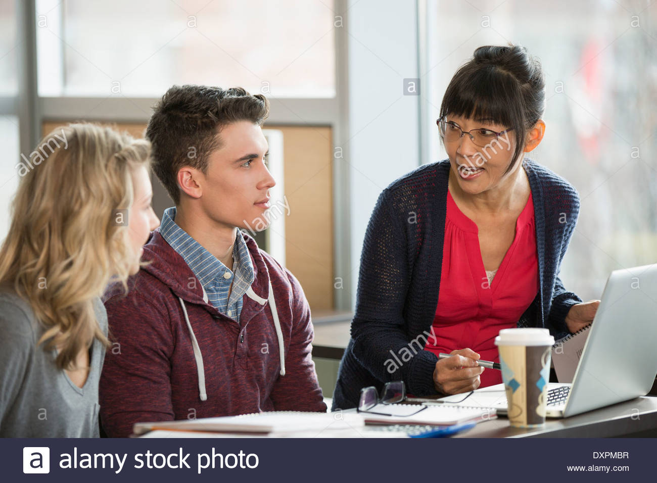 Professor talking to group students hi-res stock photography and images ...