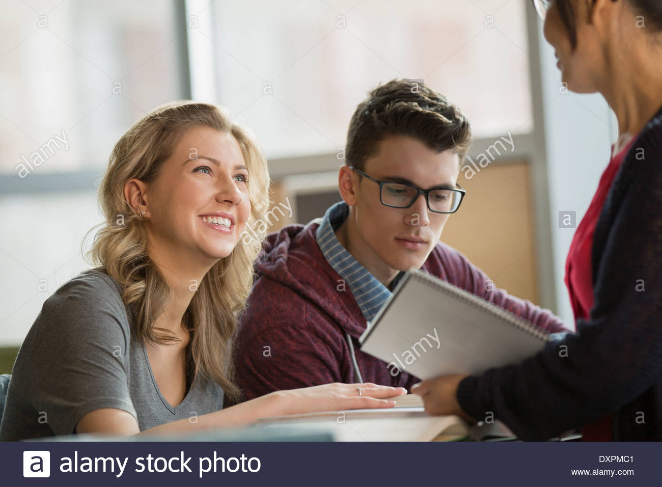 Woman head and shoulders smile teacher hi-res stock photography and ...
