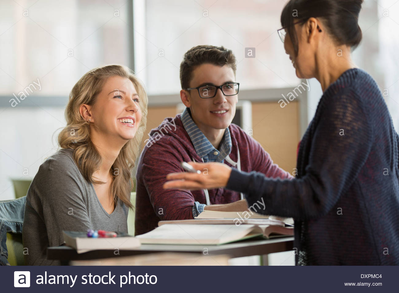 Professor talking to group students hi-res stock photography and images ...