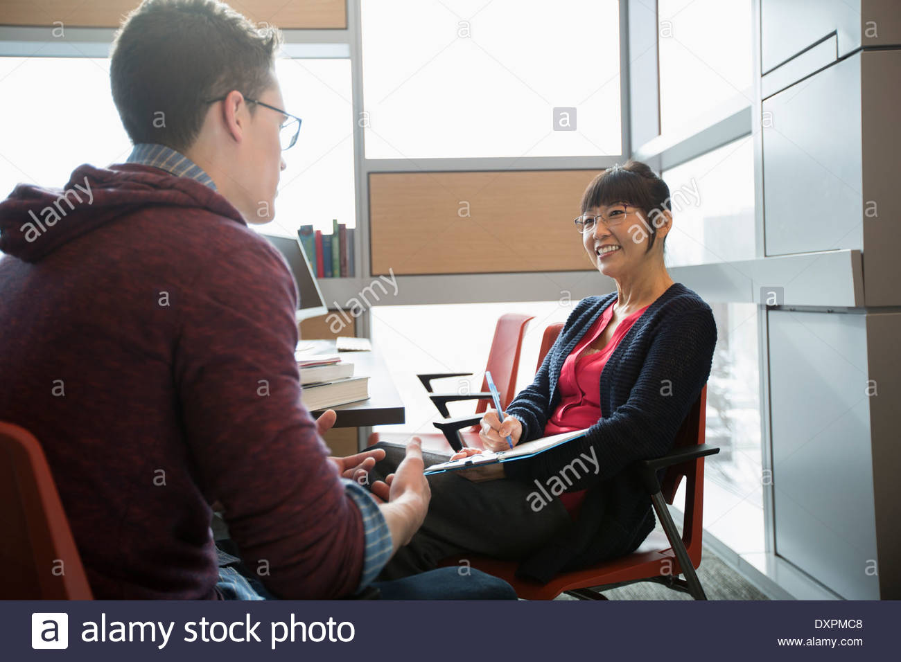 Guidance counselor and student talking hi-res stock photography and ...