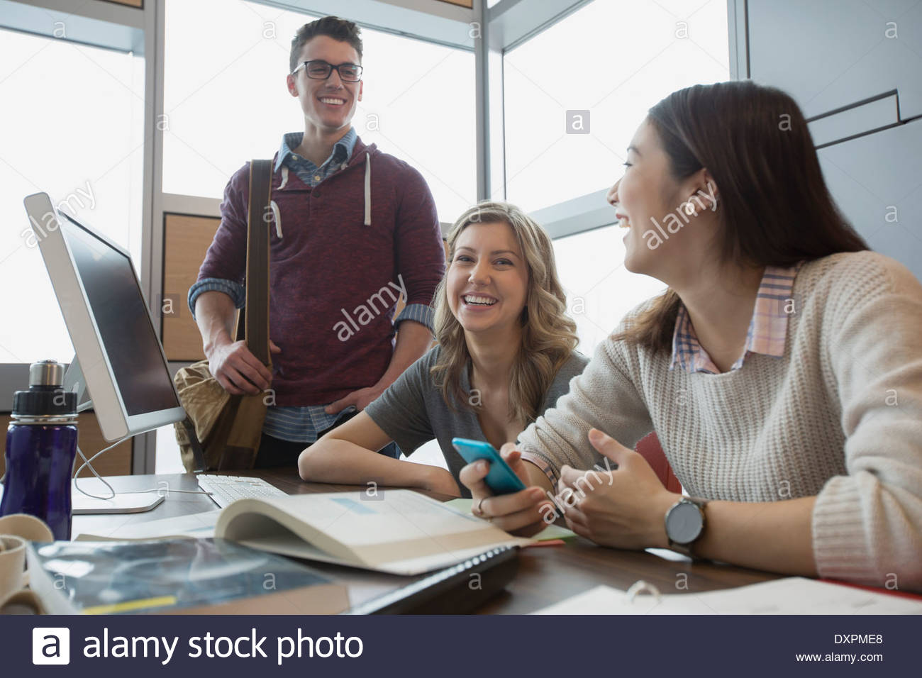Happy university students hi-res stock photography and images - Alamy