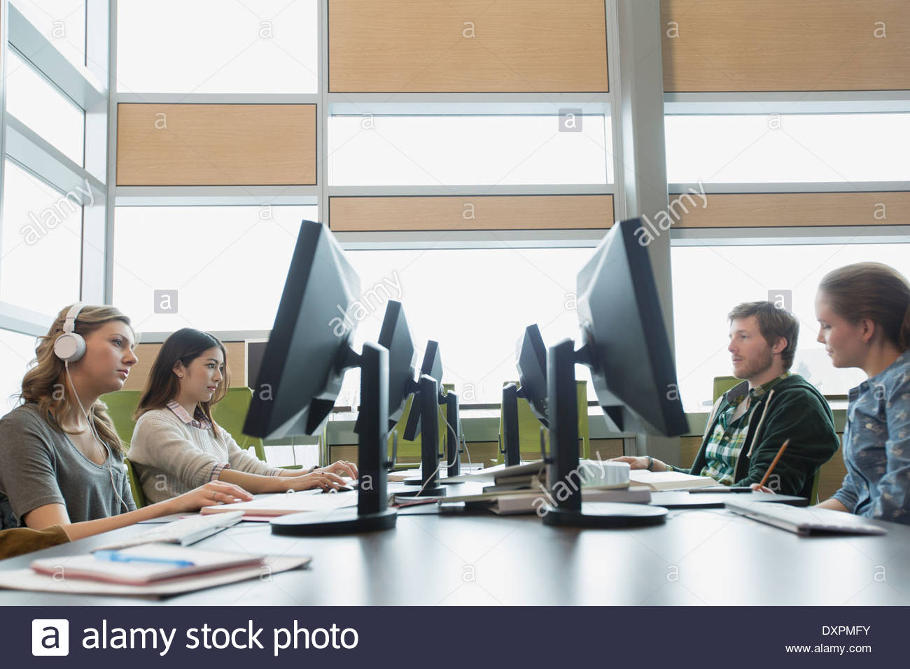Student using headphone in classroom hi-res stock photography and ...