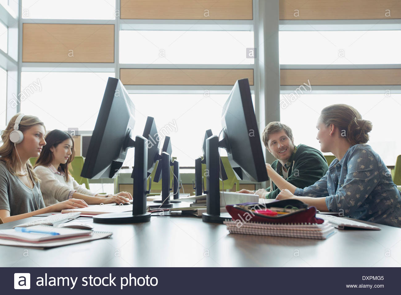 Student using headphone in classroom hi-res stock photography and ...