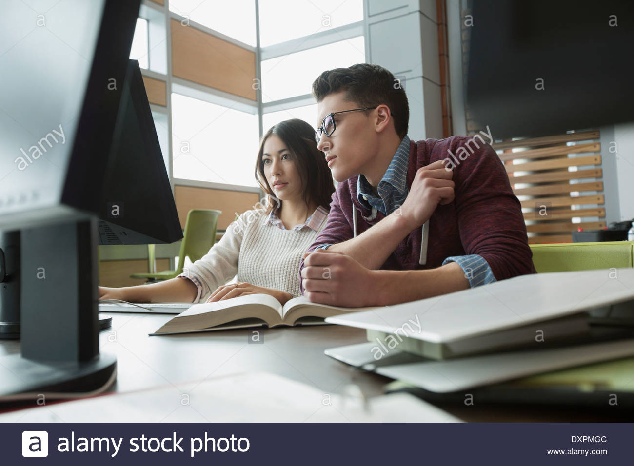 Students researching on computer hi-res stock photography and images ...