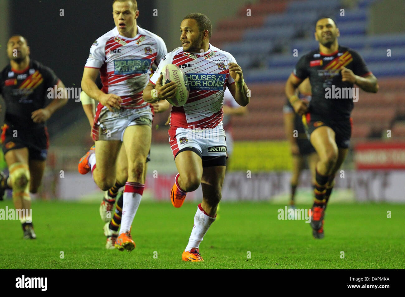 Wigan, UK. 28th Mar, 2014. Matty Bowen of Wigan Warriors intercepts the ...
