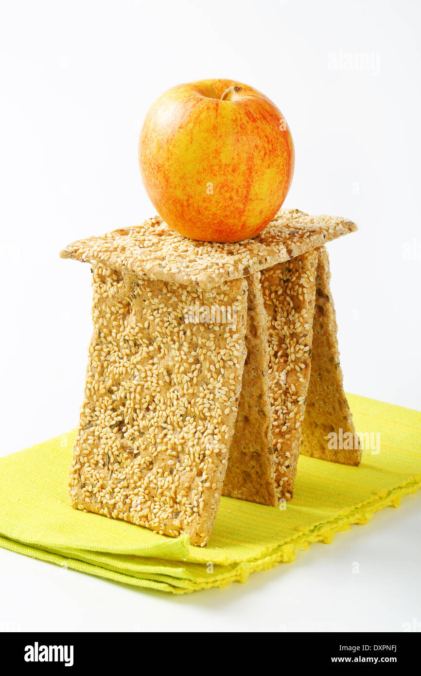 Whole wheat crackers with sesame seeds and chopped herbs Stock Photo ...