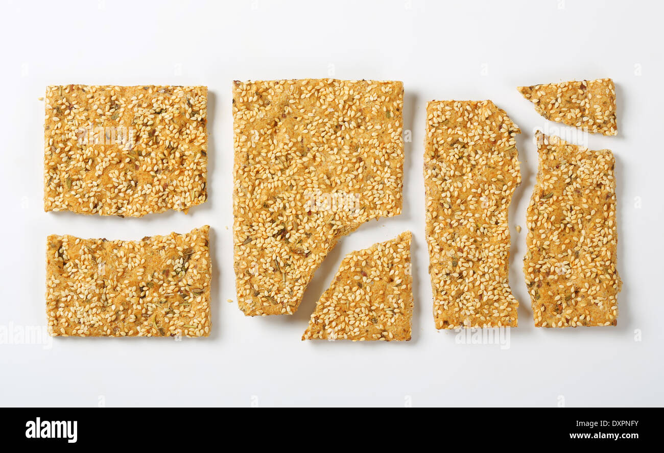 Whole wheat crackers with sesame seeds and chopped herbs Stock Photo ...