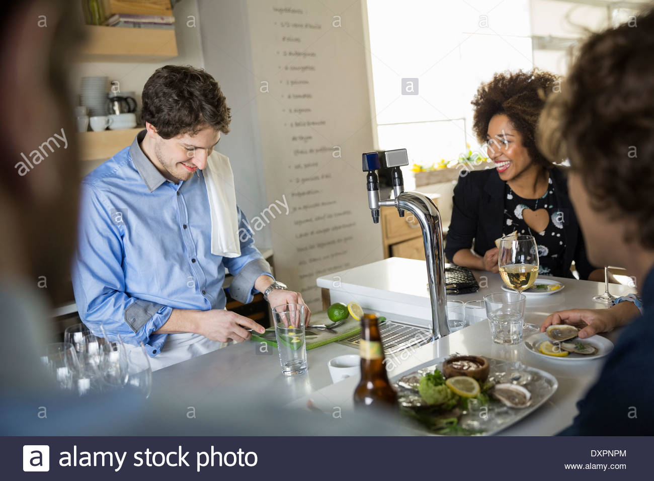 Bartender customers hi-res stock photography and images - Alamy