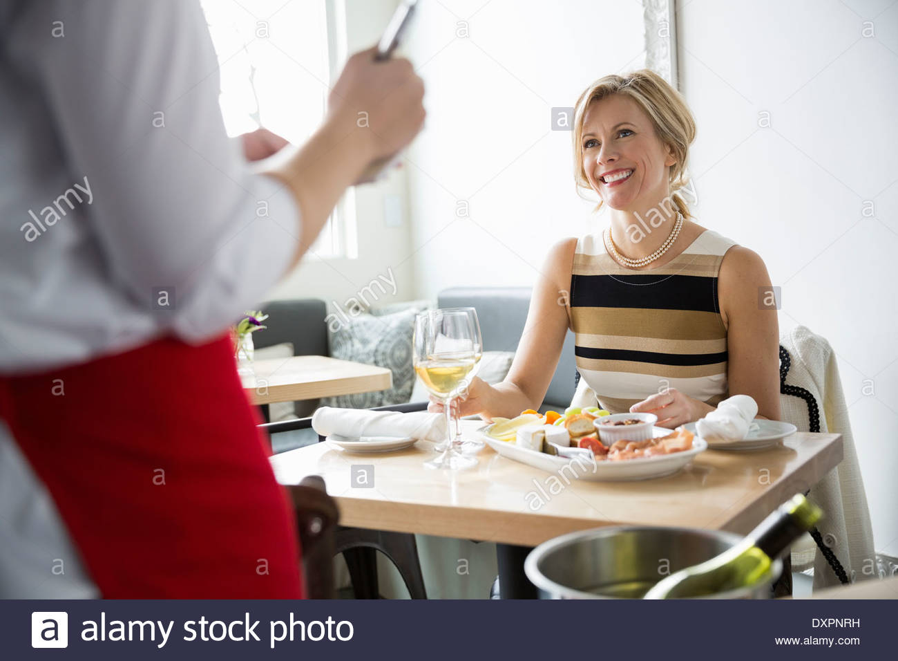 Serving server cafe restaurant bistro hi-res stock photography and ...