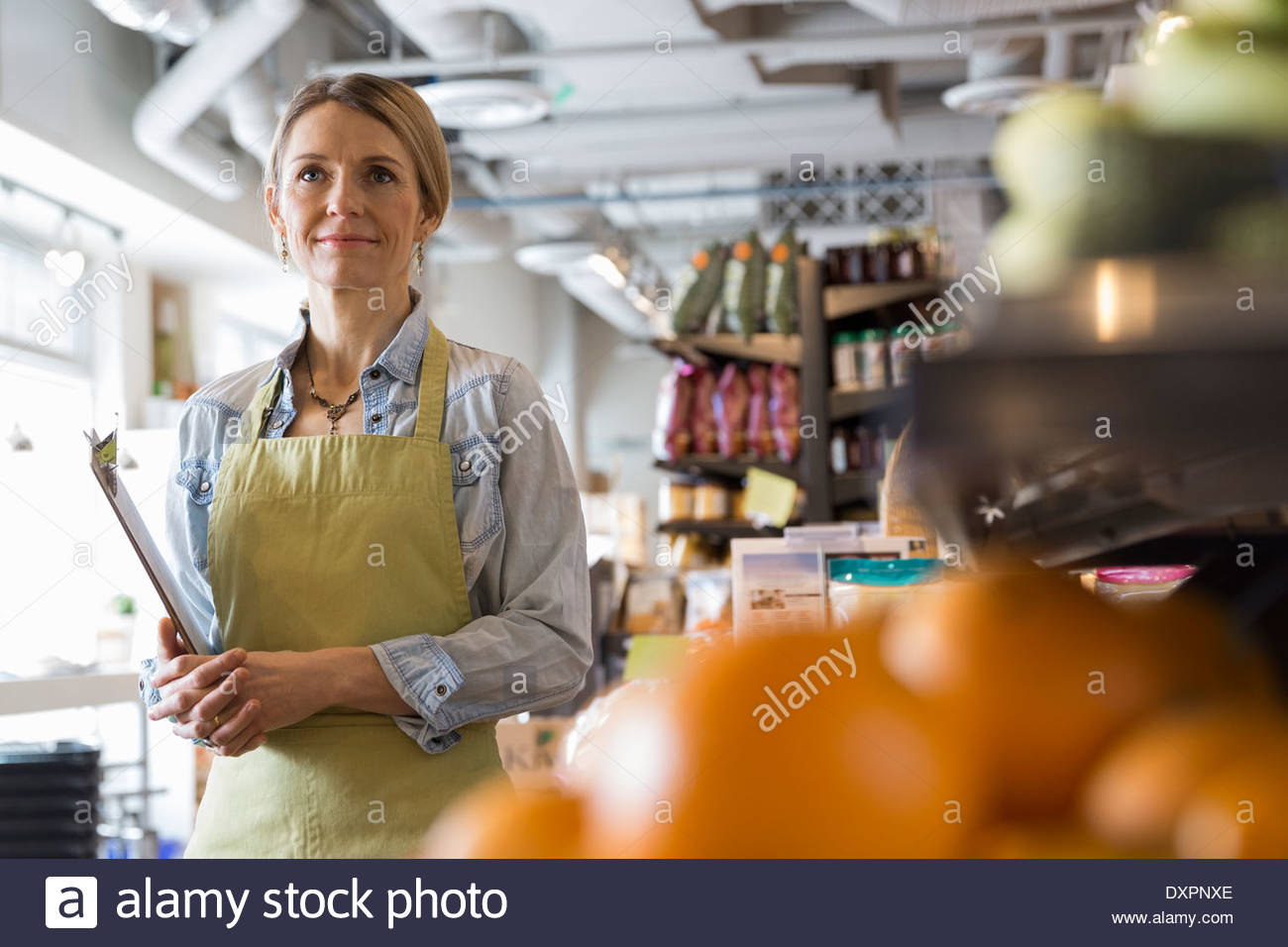 Produce worker supermarket hi-res stock photography and images - Alamy