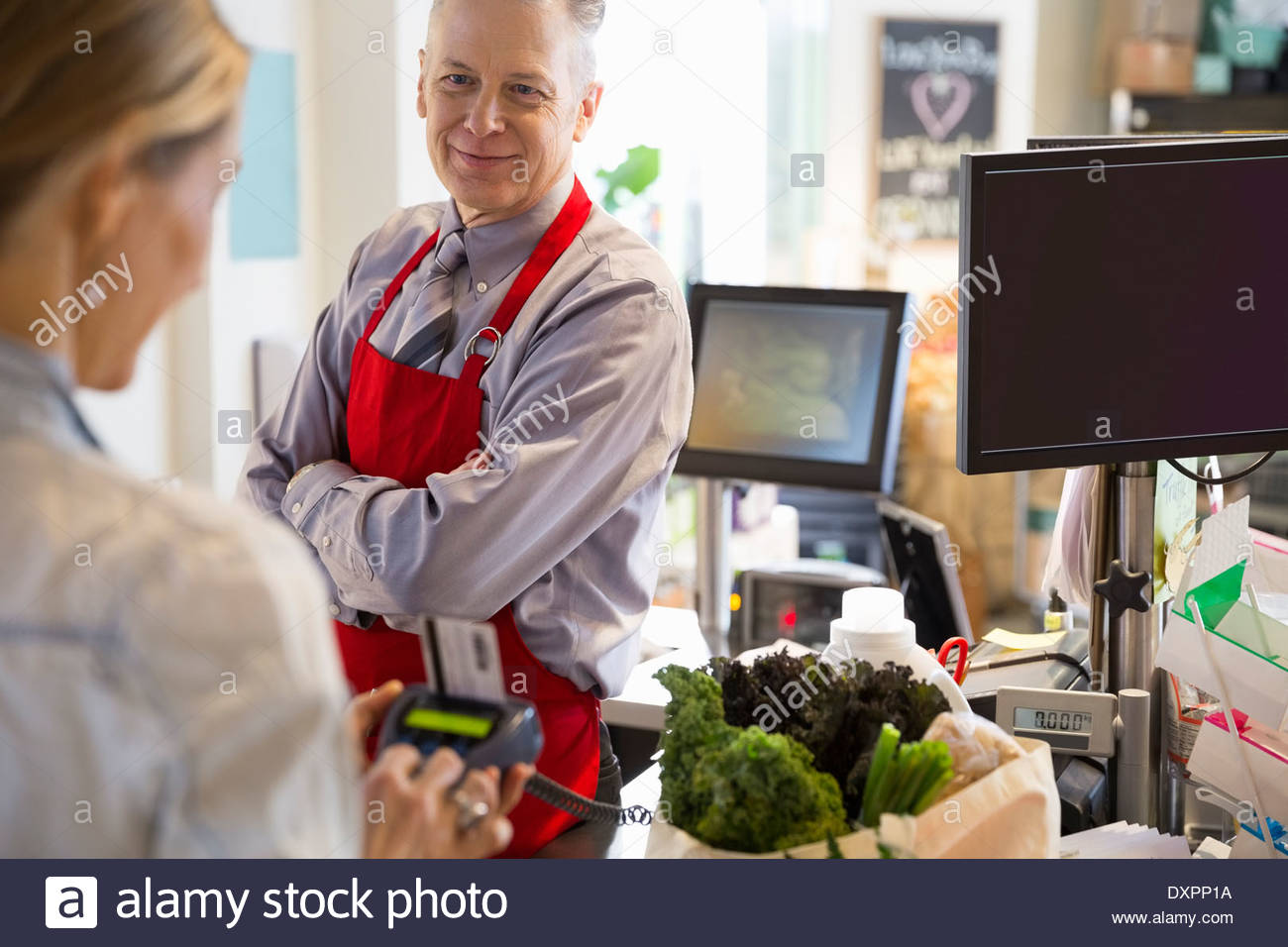 Woman shopping at supermarket hi-res stock photography and images - Alamy