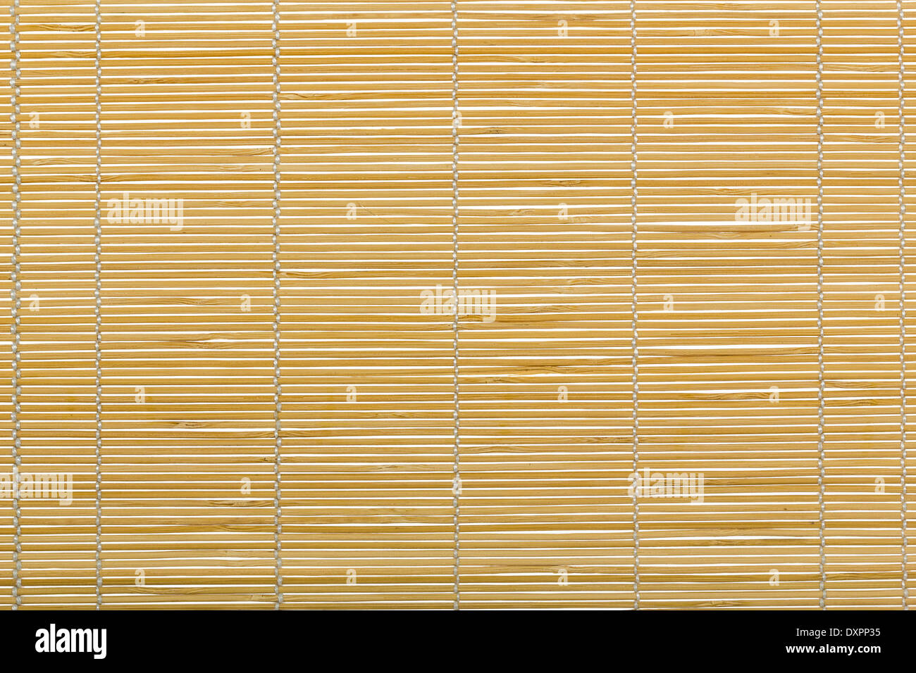 Yellow bamboo mat, background Stock Photo - Alamy