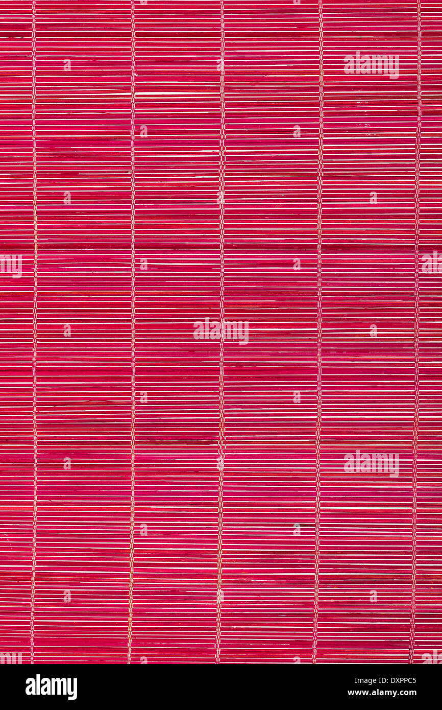 Red bamboo mat, background Stock Photo - Alamy