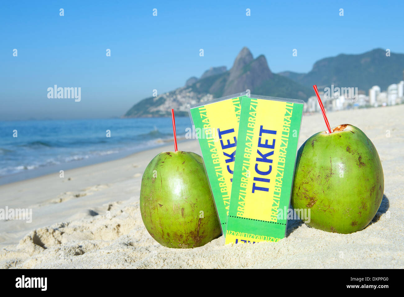 Two Brazil tickets in the sand with coconuts on the Ipanema Beach in ...