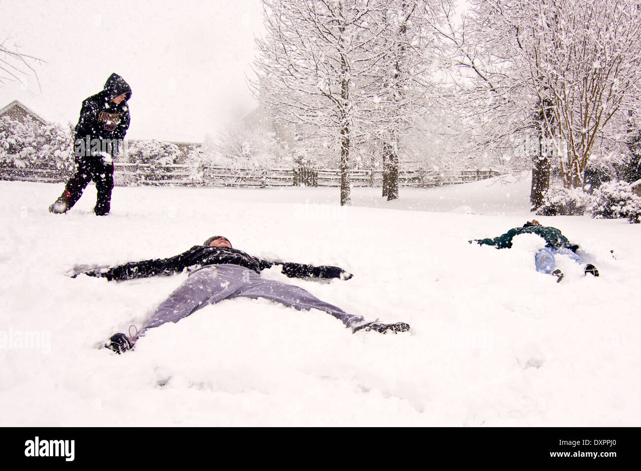 Kids Blizzard Snowstorm High Resolution Stock Photography and Images ...